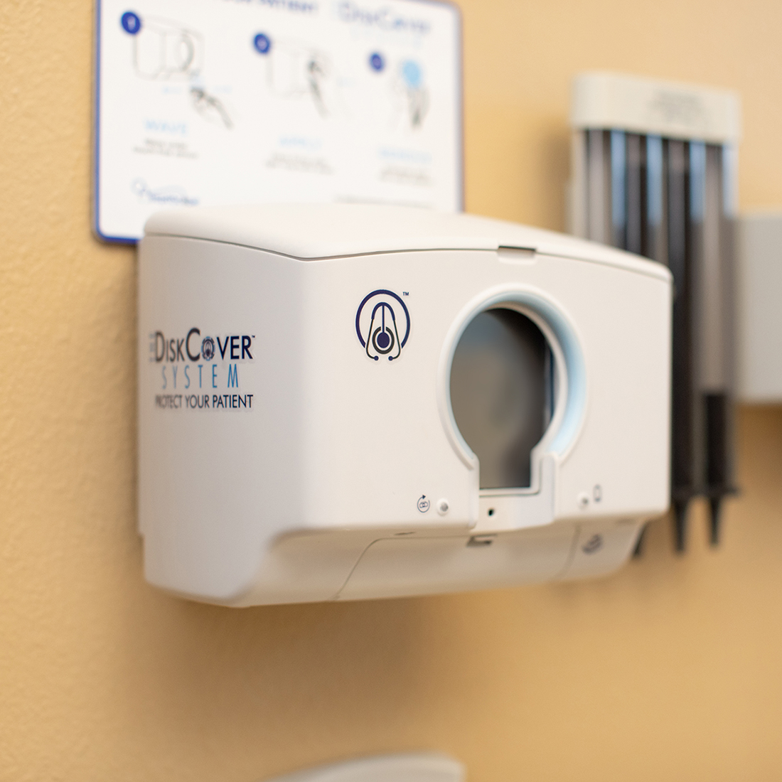 The DiskCover System Touch-Free Dispenser